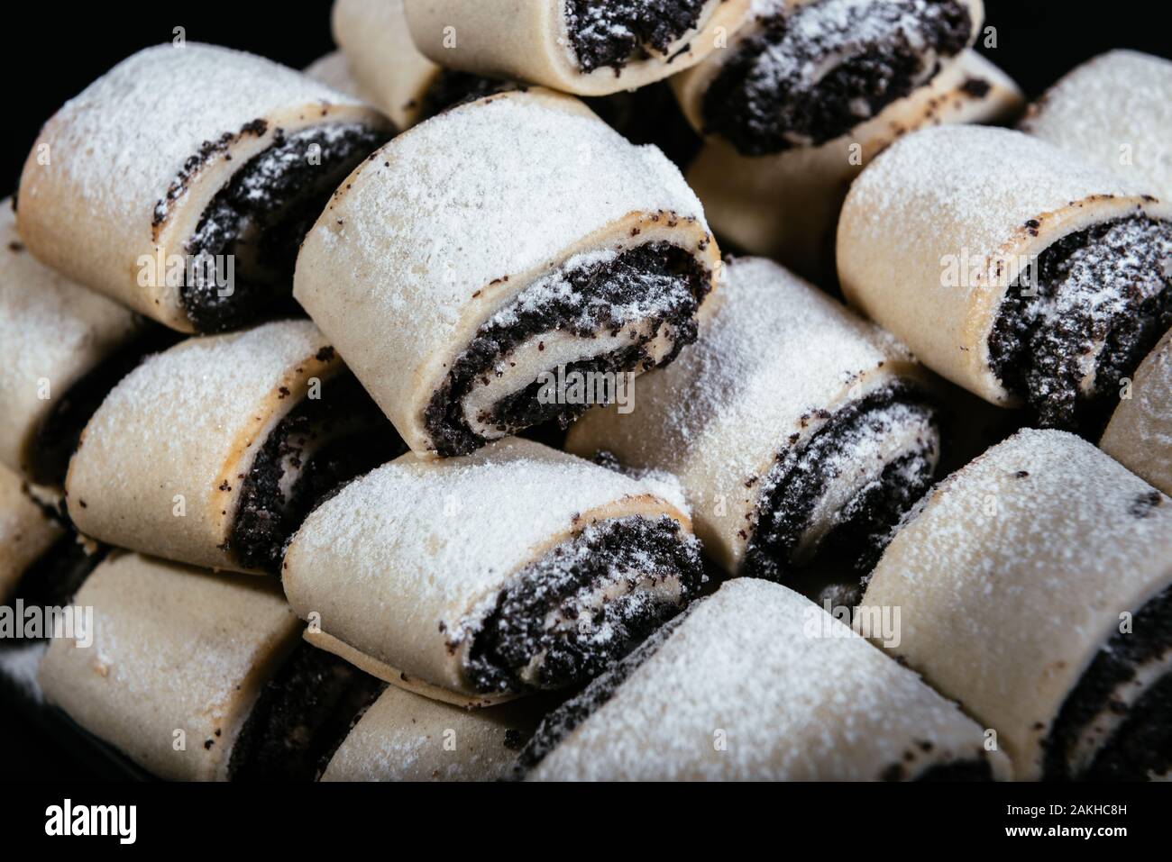 Group of poppy rolls on the dark background Stock Photo - Alamy