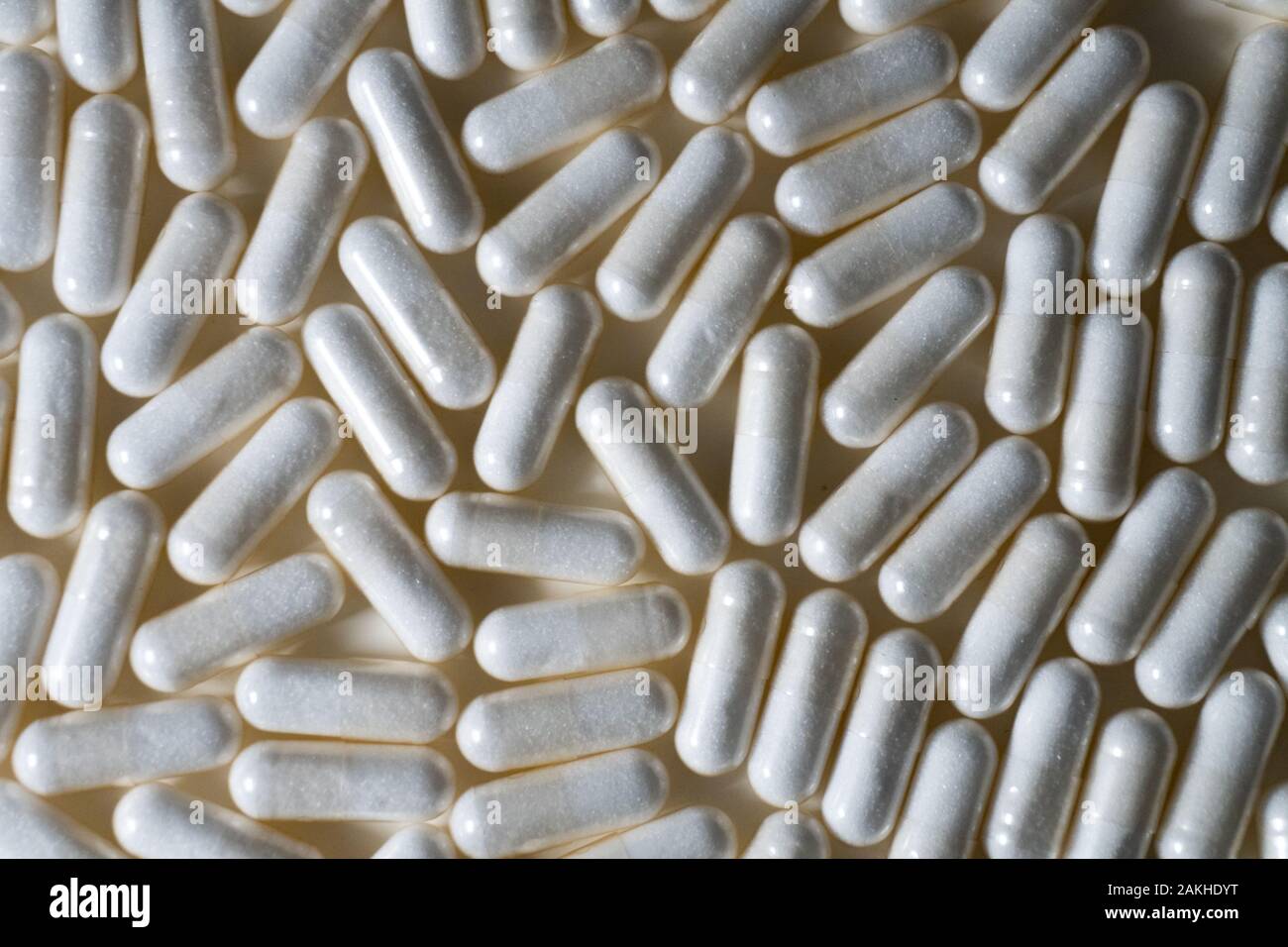 Close up oval white pill hi-res stock photography and images - Alamy