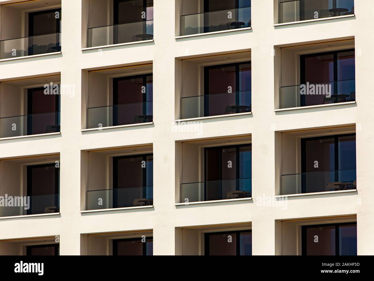 Square geometrical windows on the facade of a modern building Stock ...
