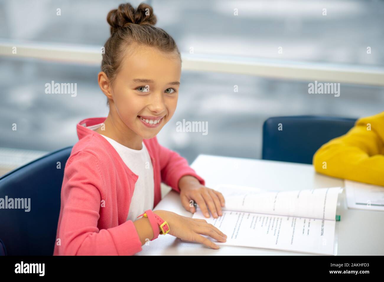 Cheerful girl being happy at her school Stock Photo - Alamy