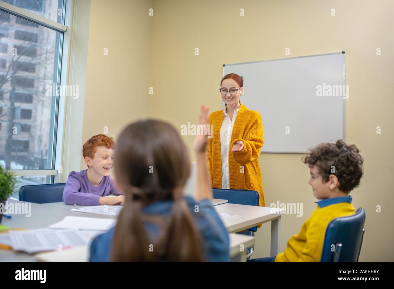 Teacher asking kids hi-res stock photography and images - Alamy
