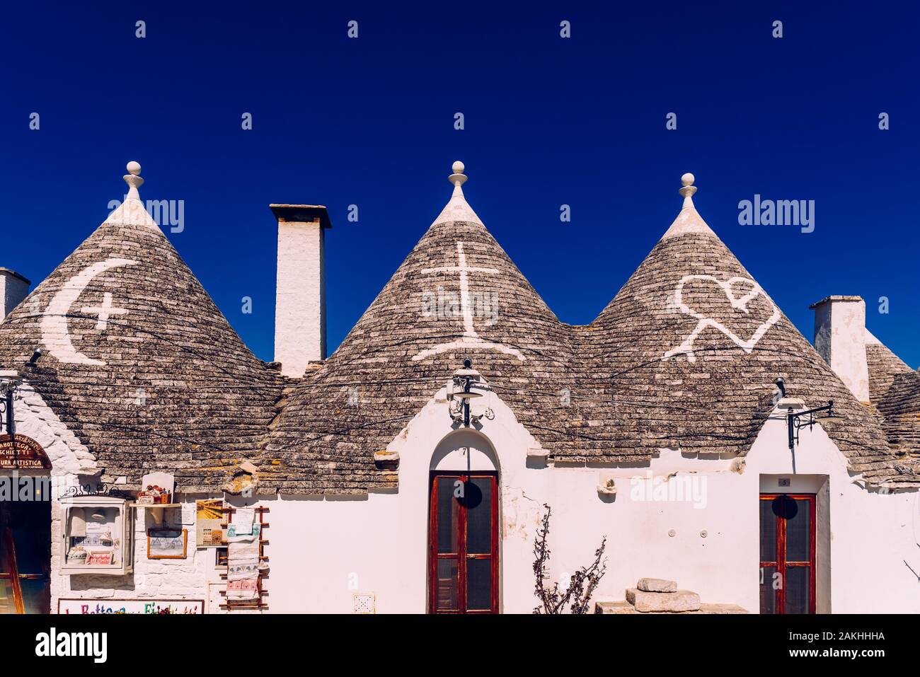 Roofs with symbols in the trulli, in the famous Italian city of ...