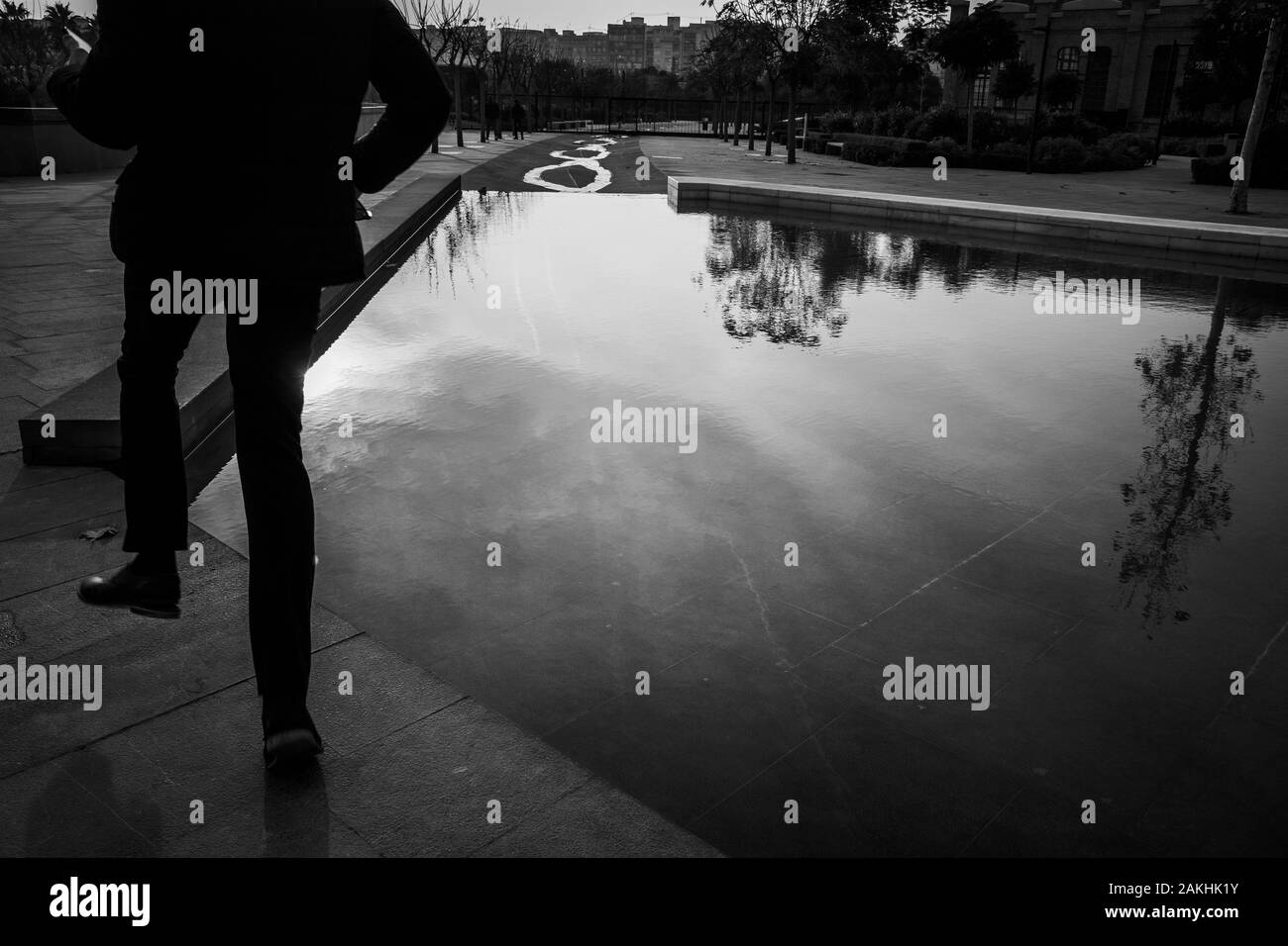 A man runs in a hurry, out of focus for sensation of movement, in a ...