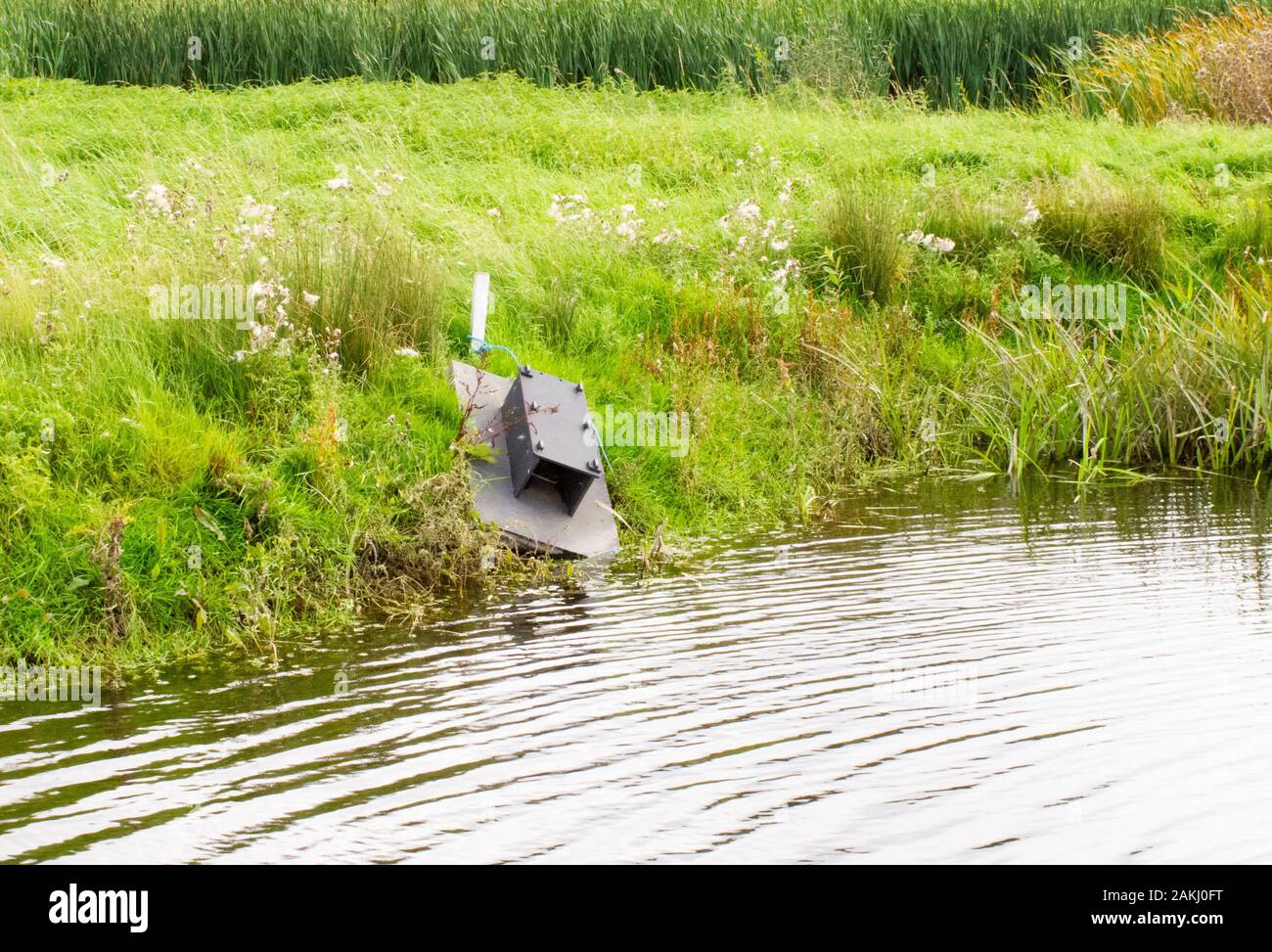 Mink box (raft) on the back at The Moors, Redhill, Surrey Stock Photo ...