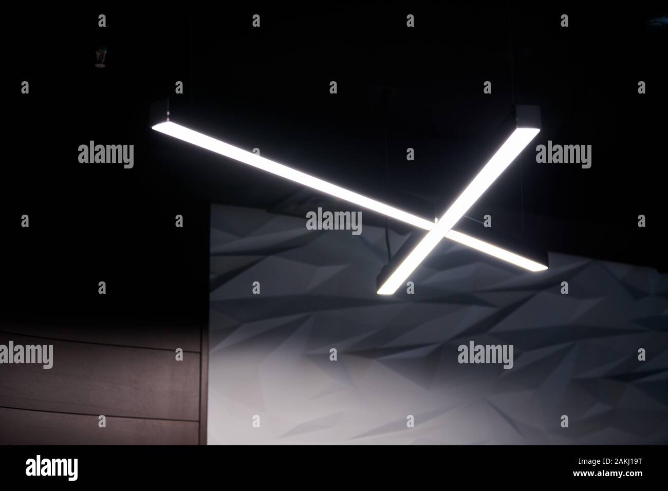 Modern office lighting. Thin lamps in office dark ceiling. LED white ...