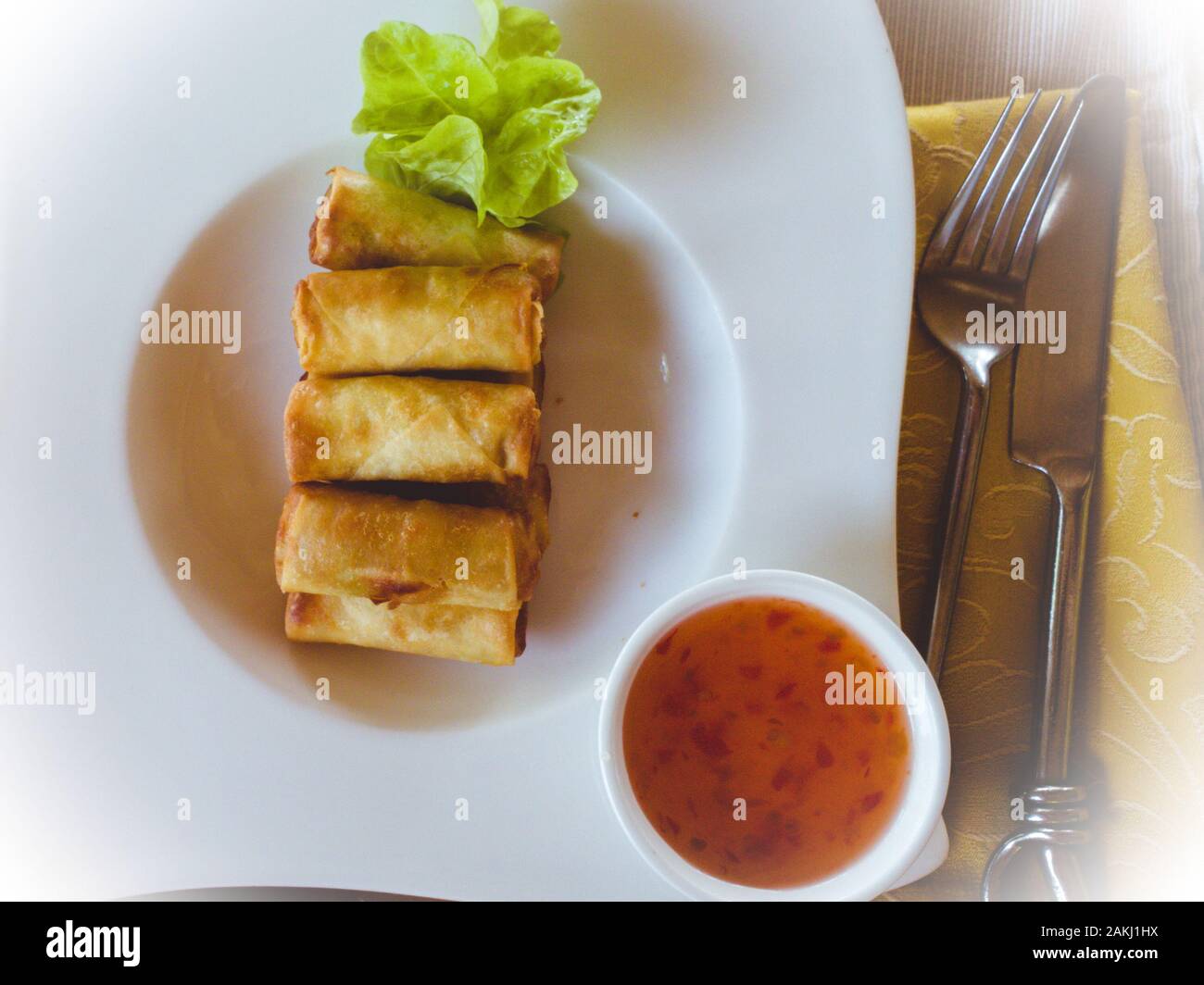 Delicious dish of vegetarian spring rolls with sweet and sour sauce ...