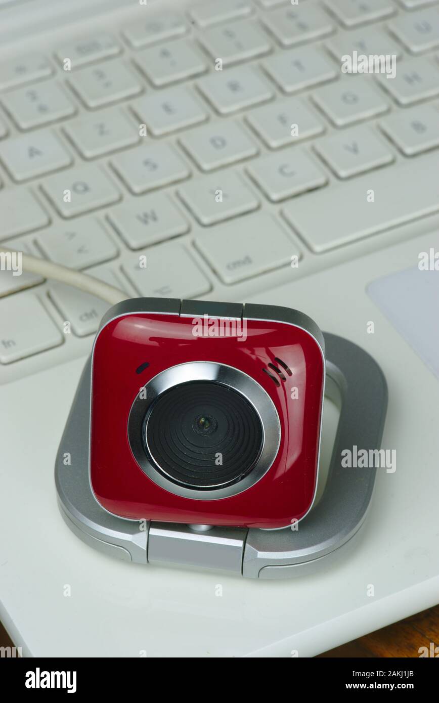 red and white webcam on a white computer keyboard Stock Photo - Alamy