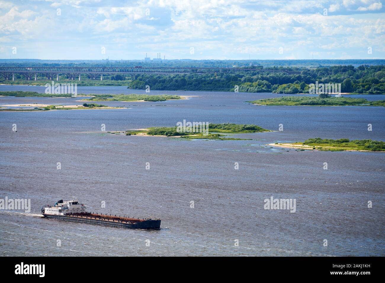 Barge on river sailing to port for cargo. Transport for transportation ...