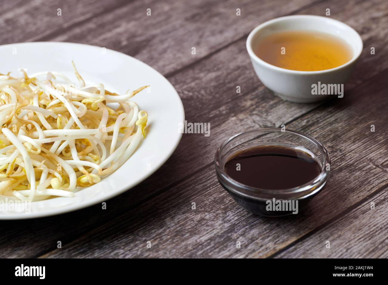 Mung bean sprouts in plate. Raw organic healthy food. Traditional ...