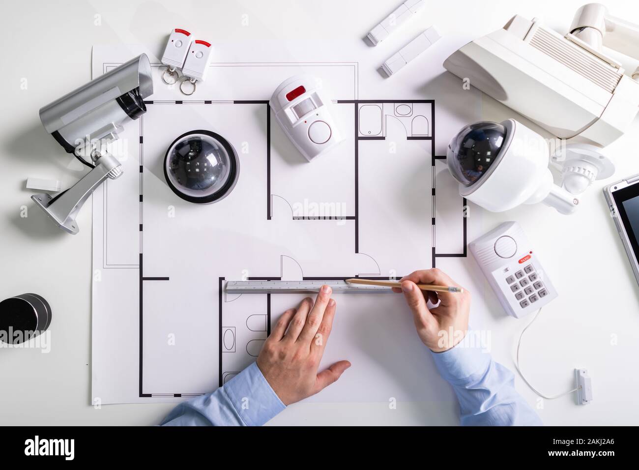 Close-up Of An Architect's Hand Drawing Blueprint With Security ...