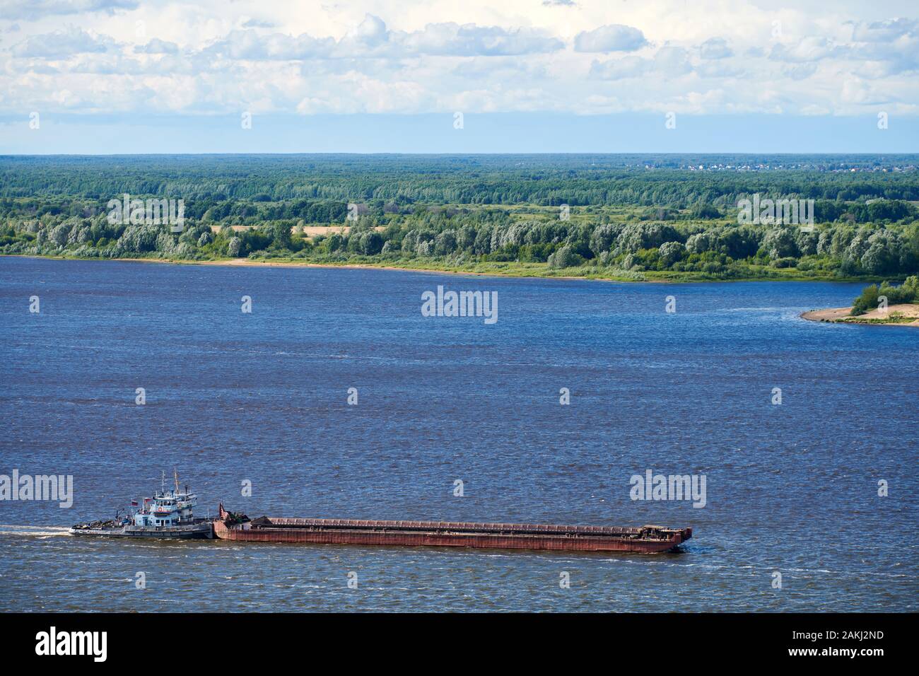 Barge on river sailing to port for cargo. Transport for transportation ...