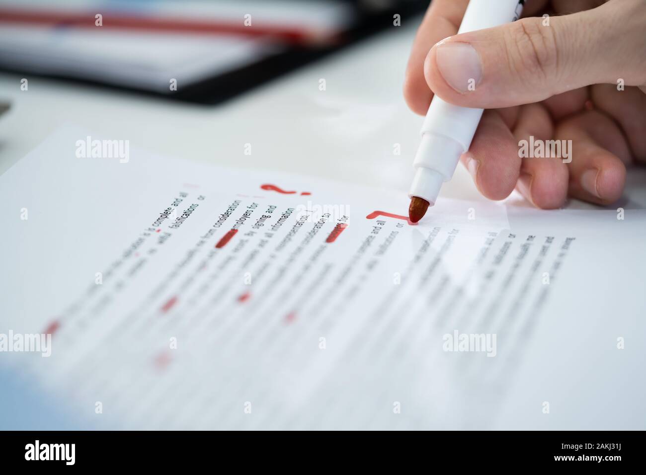 Close-up Of Red Pencil Marking Error During Spellchecking Text On Paper ...