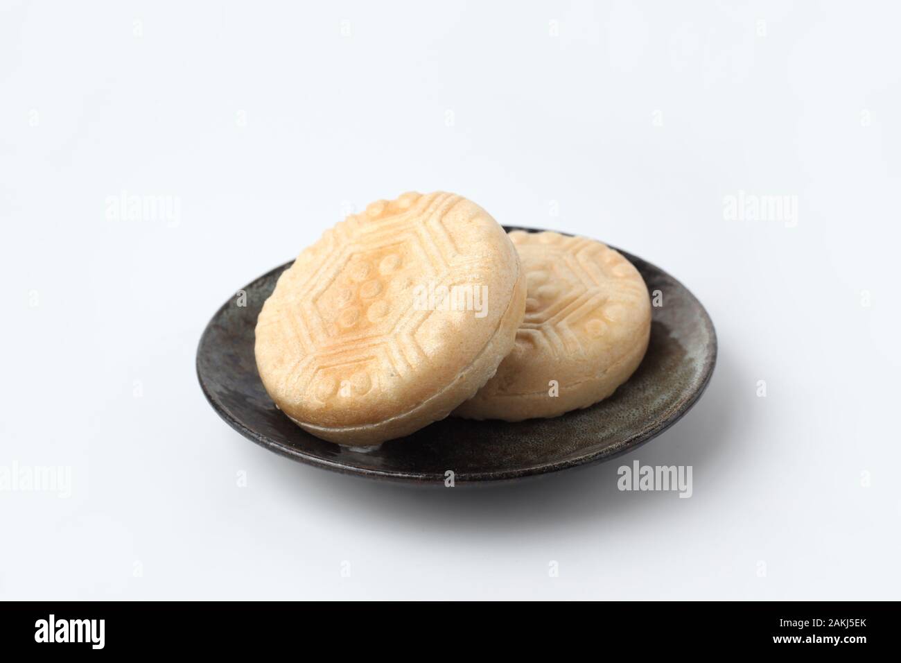 Monaka japanese confectionery wafers cake on plate isolated on white ...