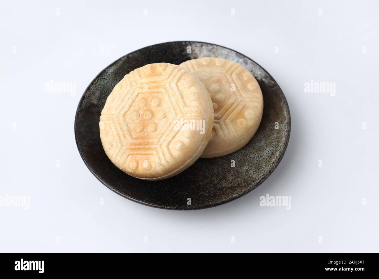 Monaka japanese confectionery wafers cake on plate isolated on white ...