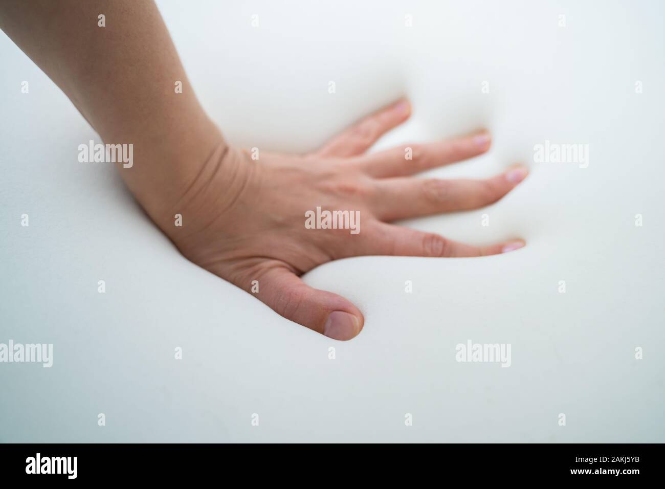 Hand Testing Orthopedic Memory Foam Core Mattress Stock Photo - Alamy