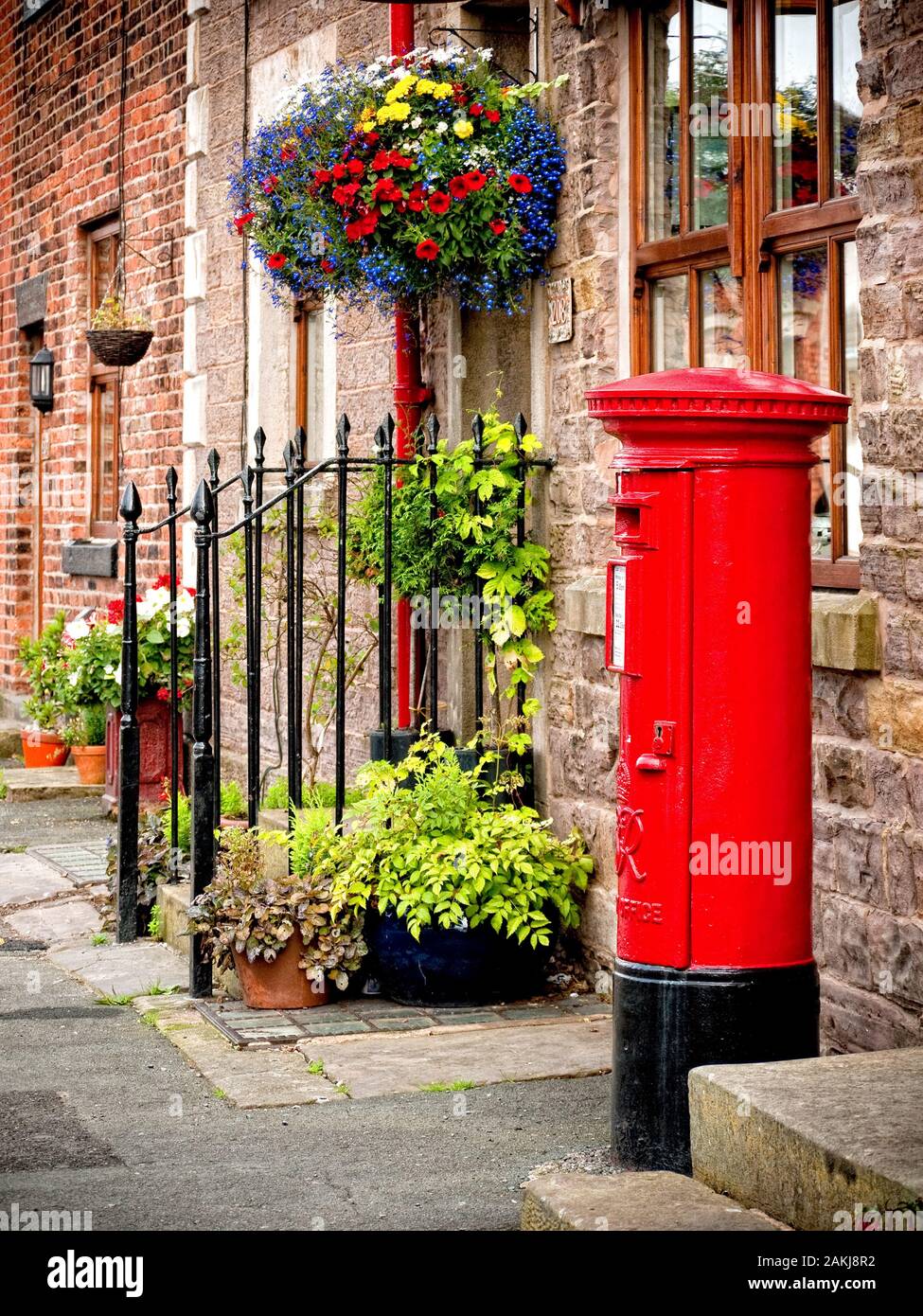 Bright red Post Box at Wheelton, UK Stock Photo - Alamy