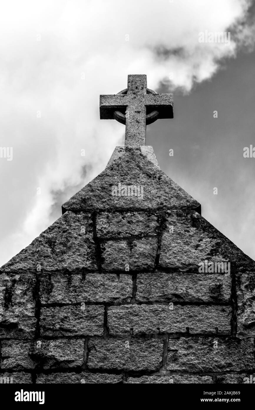 Fragment of stone roof with a cross of the ancient Catholic Church in ...