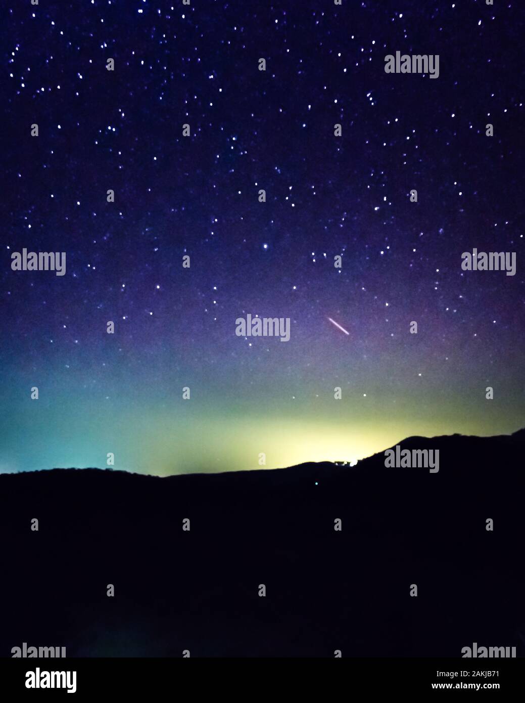 NIght Sky of Namibia with Windhuk radiating Stock Photo - Alamy