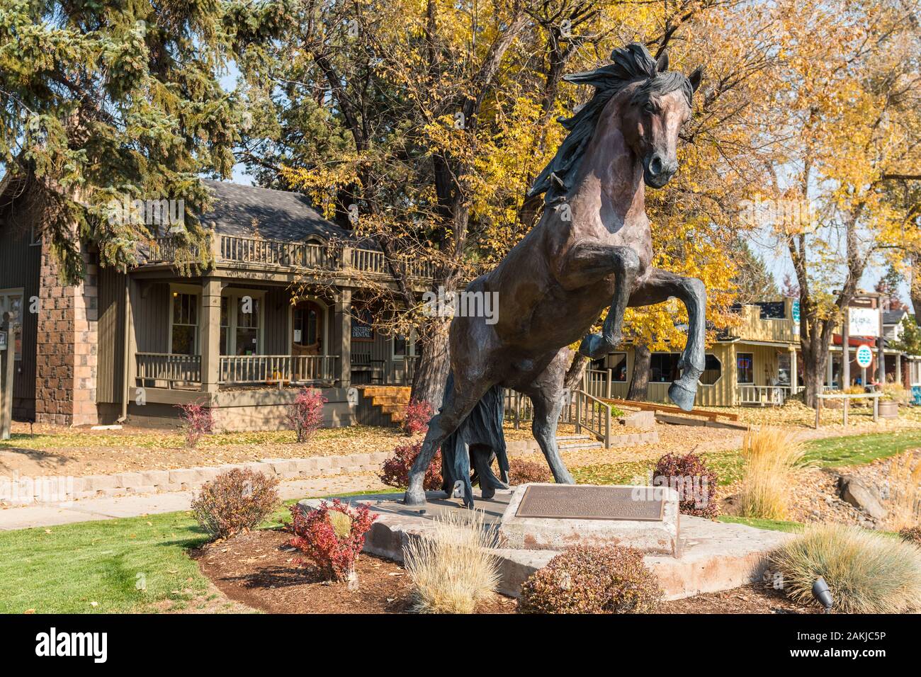 A bronze sculpture of a ramping horse on one of the main streets of ...