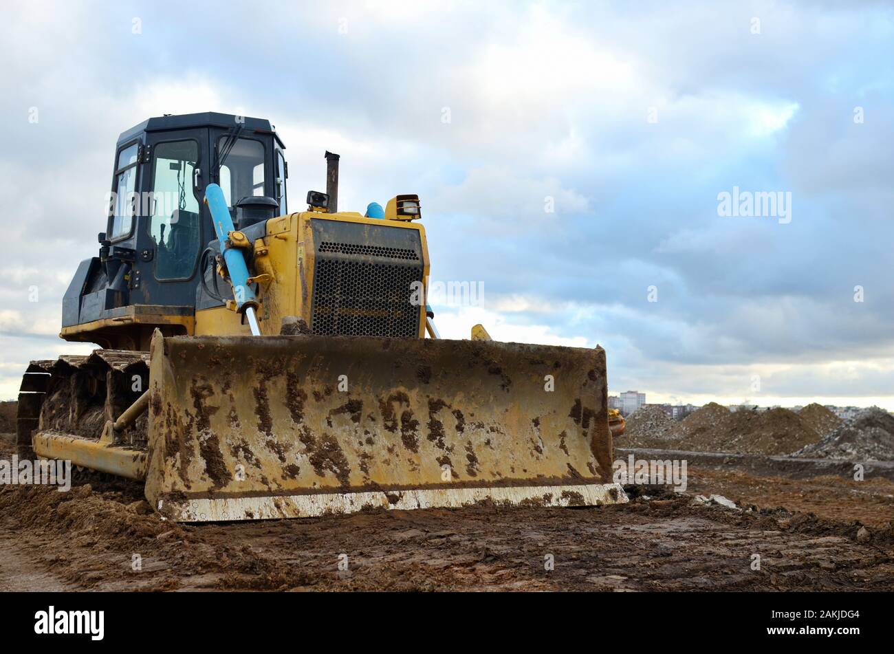 Track-type bulldozer during of large construction jobs at building site ...
