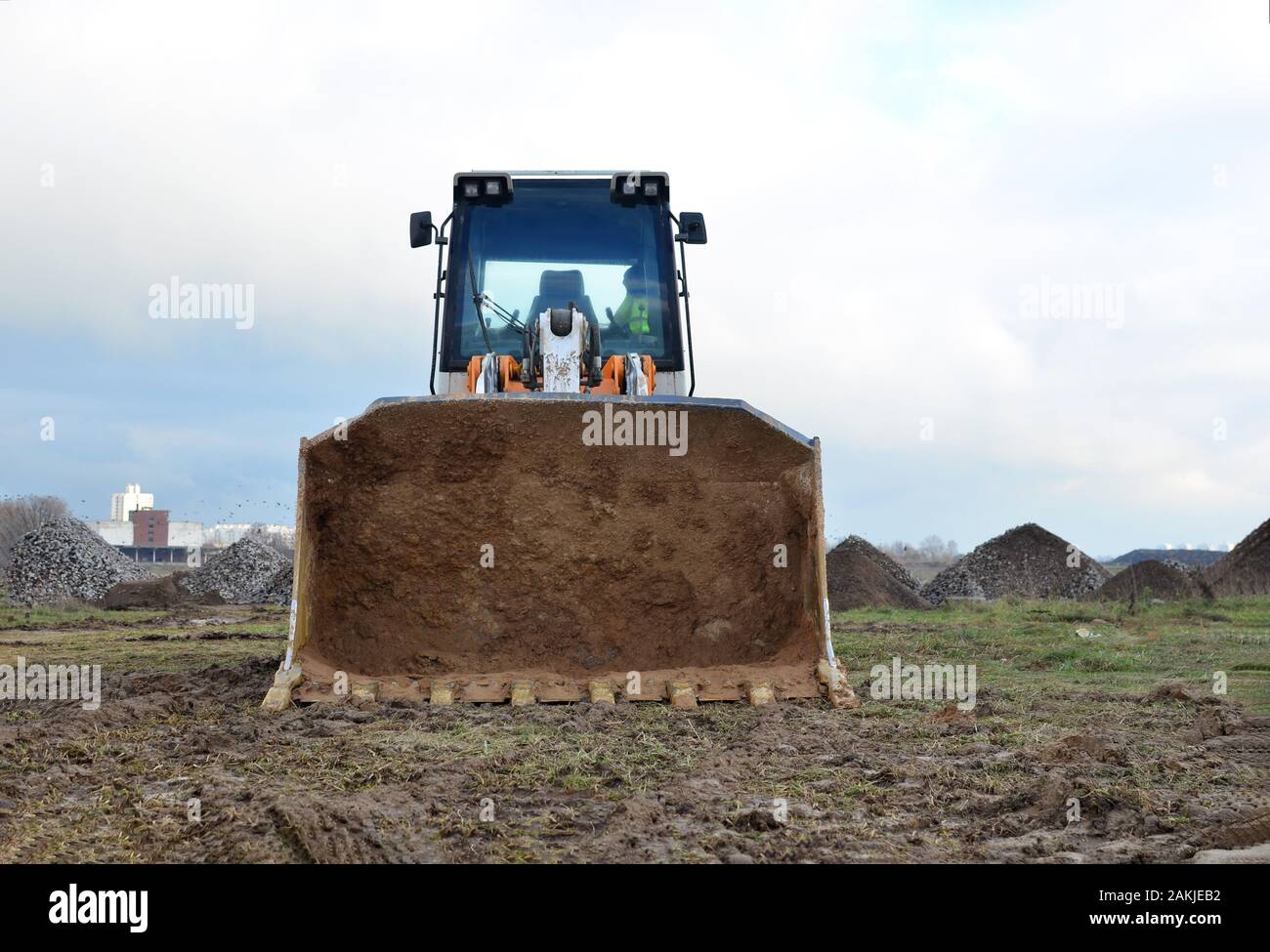 Crawler Loader at construction site. Land clearing, grading, pool ...