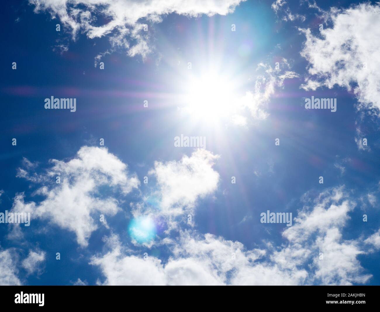 Sky with sun in summer Stock Photo - Alamy