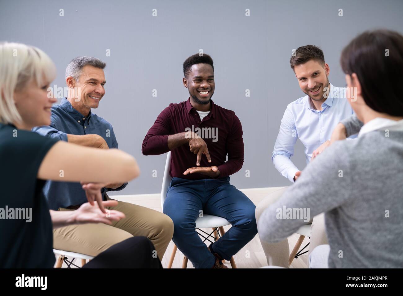 Close-up Of A Person Teaching Sign Languages To Multiethnic Pupils ...