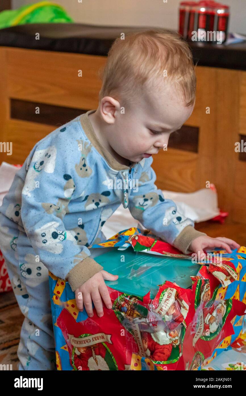 Child giving present hi-res stock photography and images - Alamy