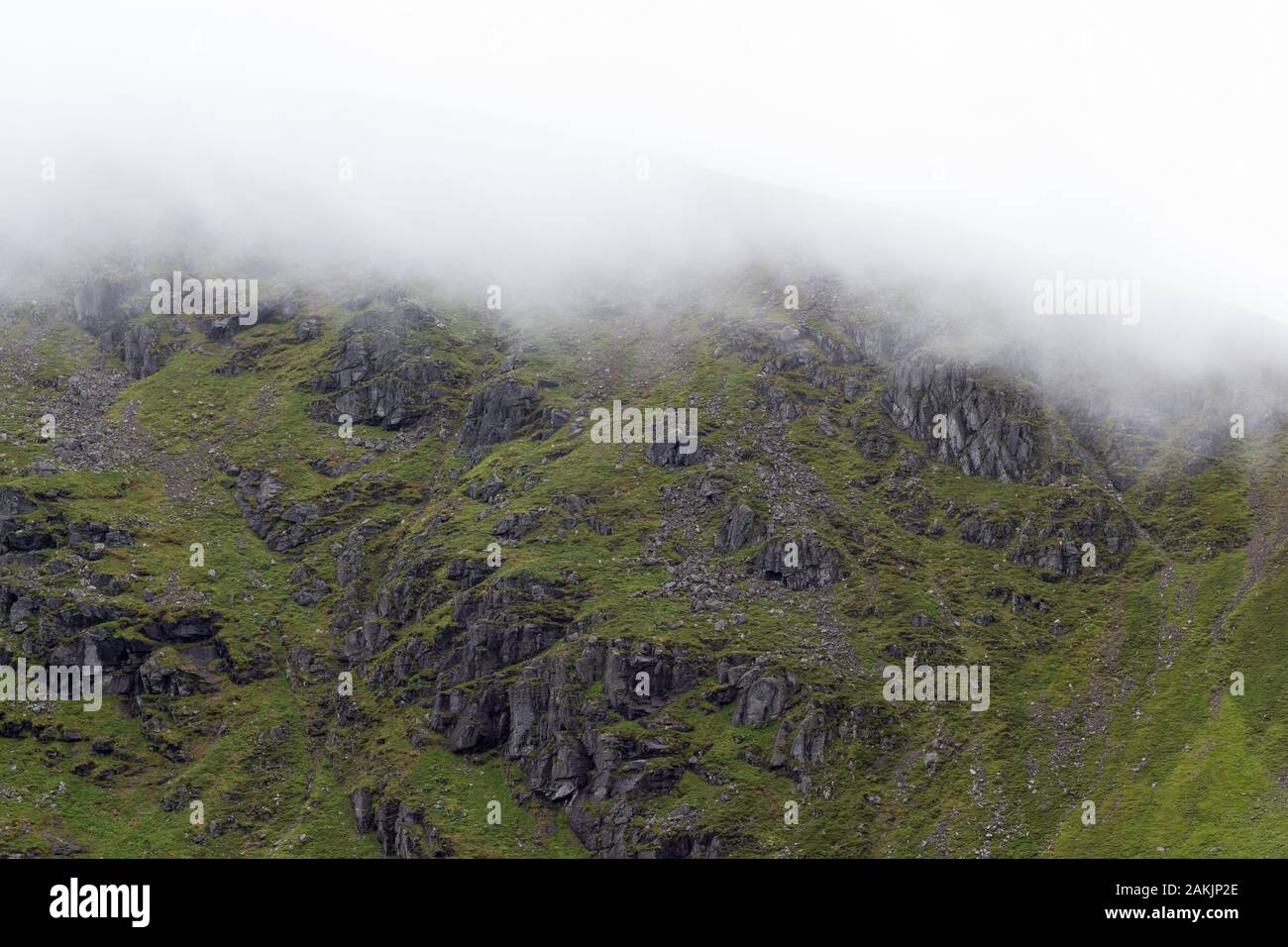 White cloud rolling down over rocky Scottish hillside Stock Photo - Alamy