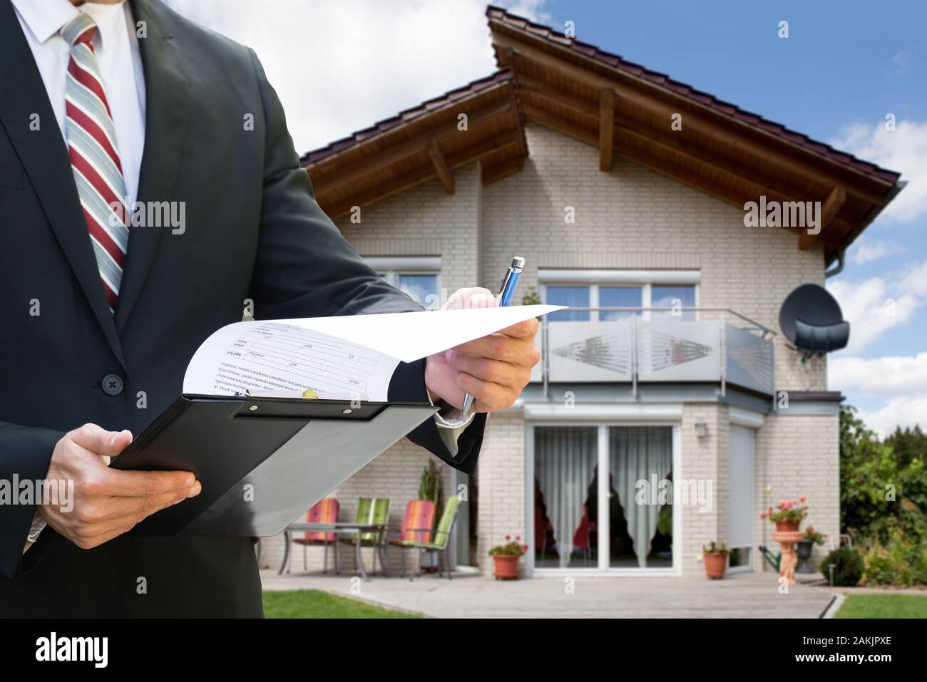 Worker checking roof construction hi-res stock photography and images ...