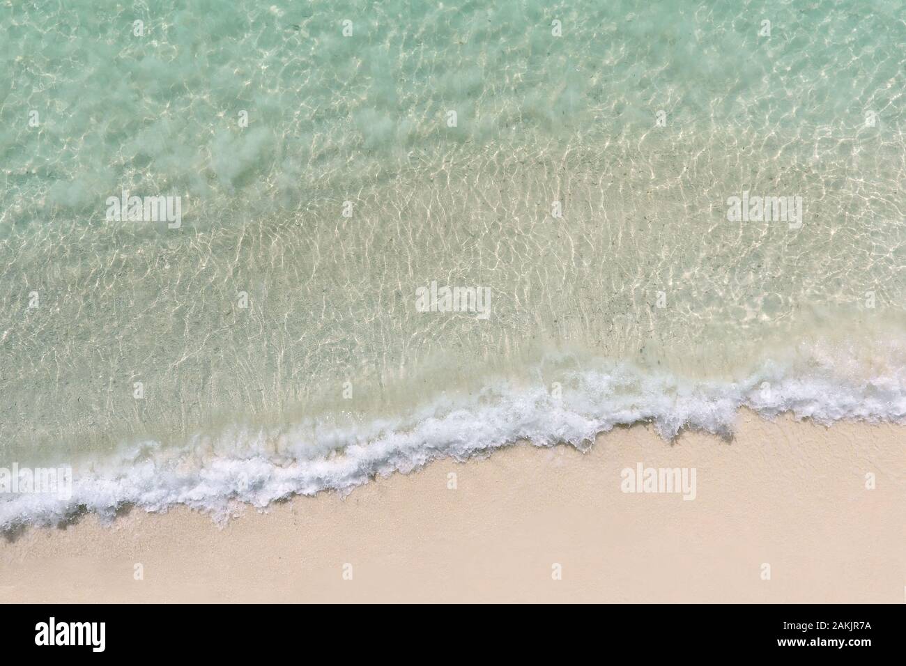 Scenic View Of A Beach With Waves In Sea Water Stock Photo - Alamy