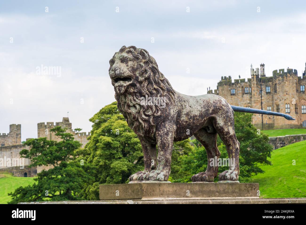 Lion on bridge at Alnwick with Alnwick Castle in background ...