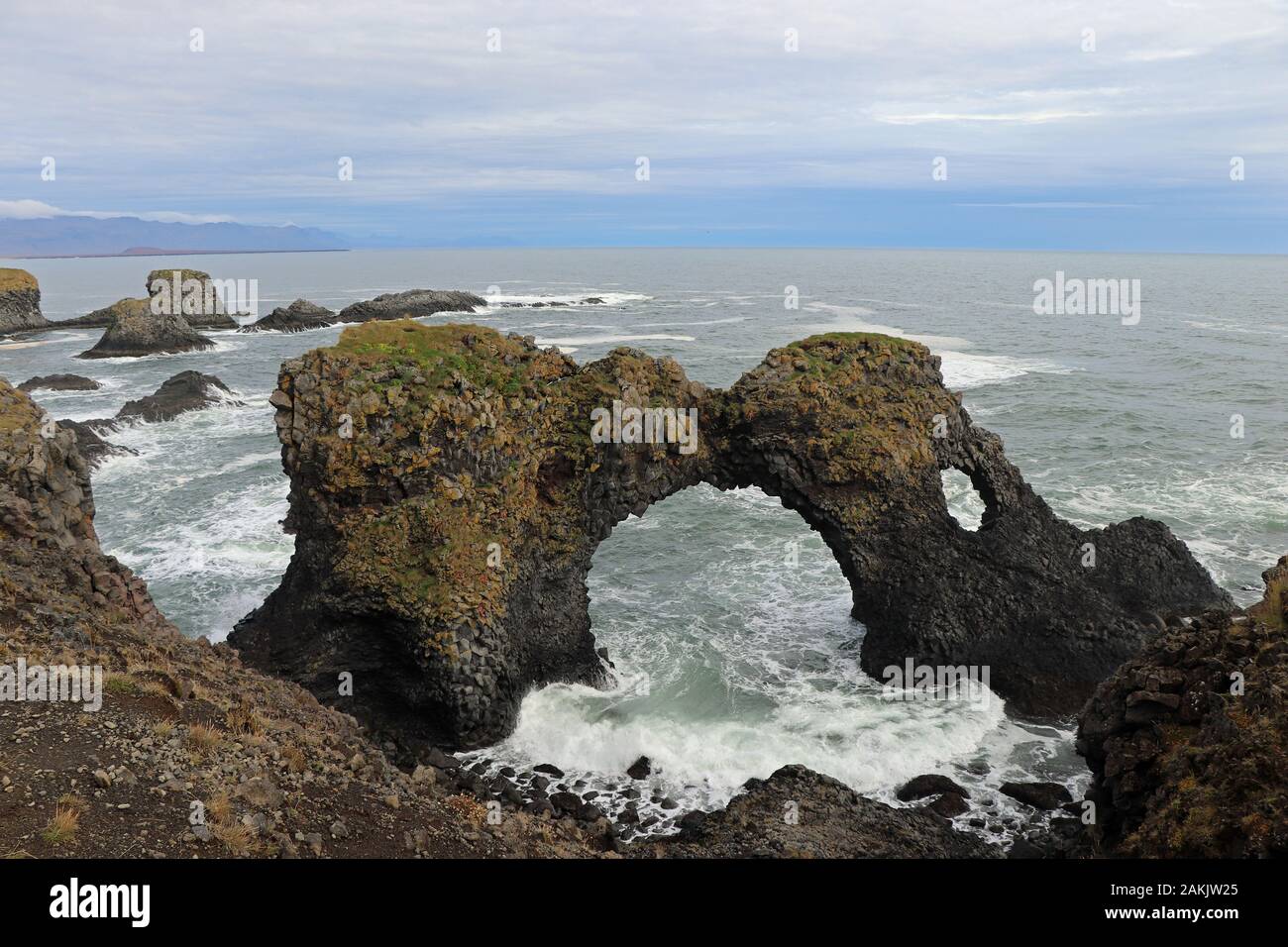 Natural rock gate that rises from the sea on Iceland nature Stock Photo ...