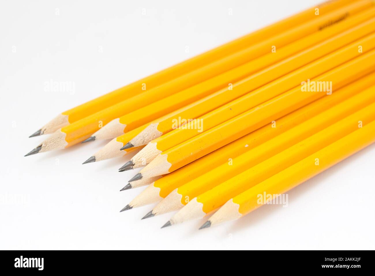 Yellow pencils isolated on white background Stock Photo - Alamy