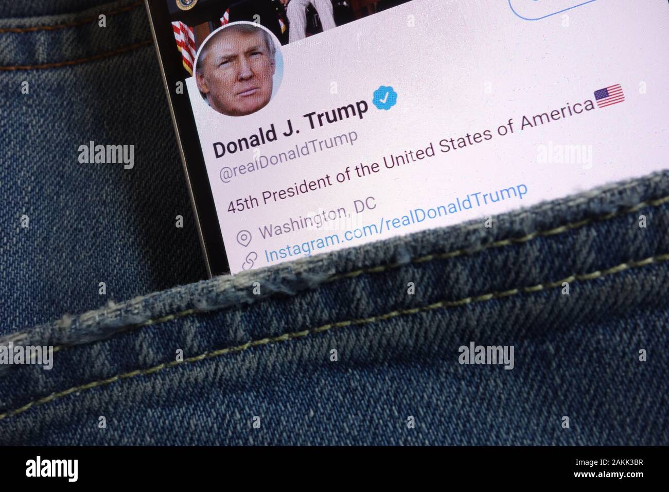 Twitter page for Donald Trump displayed on smartphone hidden in jeans ...