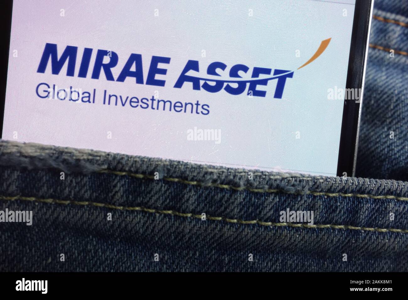 Mirae Asset Global Investments logo displayed on smartphone hidden in ...
