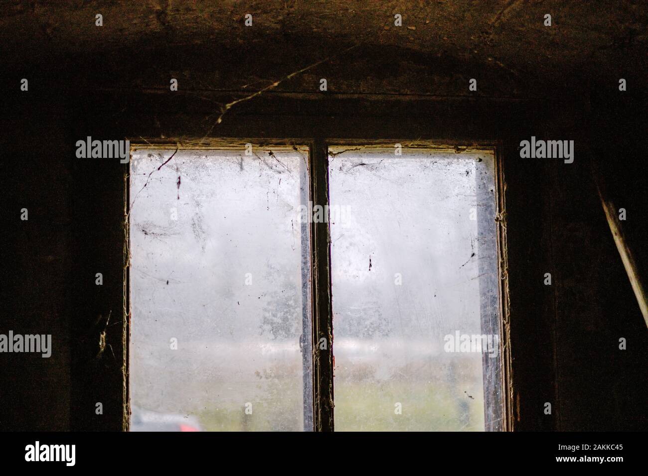 old abandoned house interior with broken furniture and empty windows ...