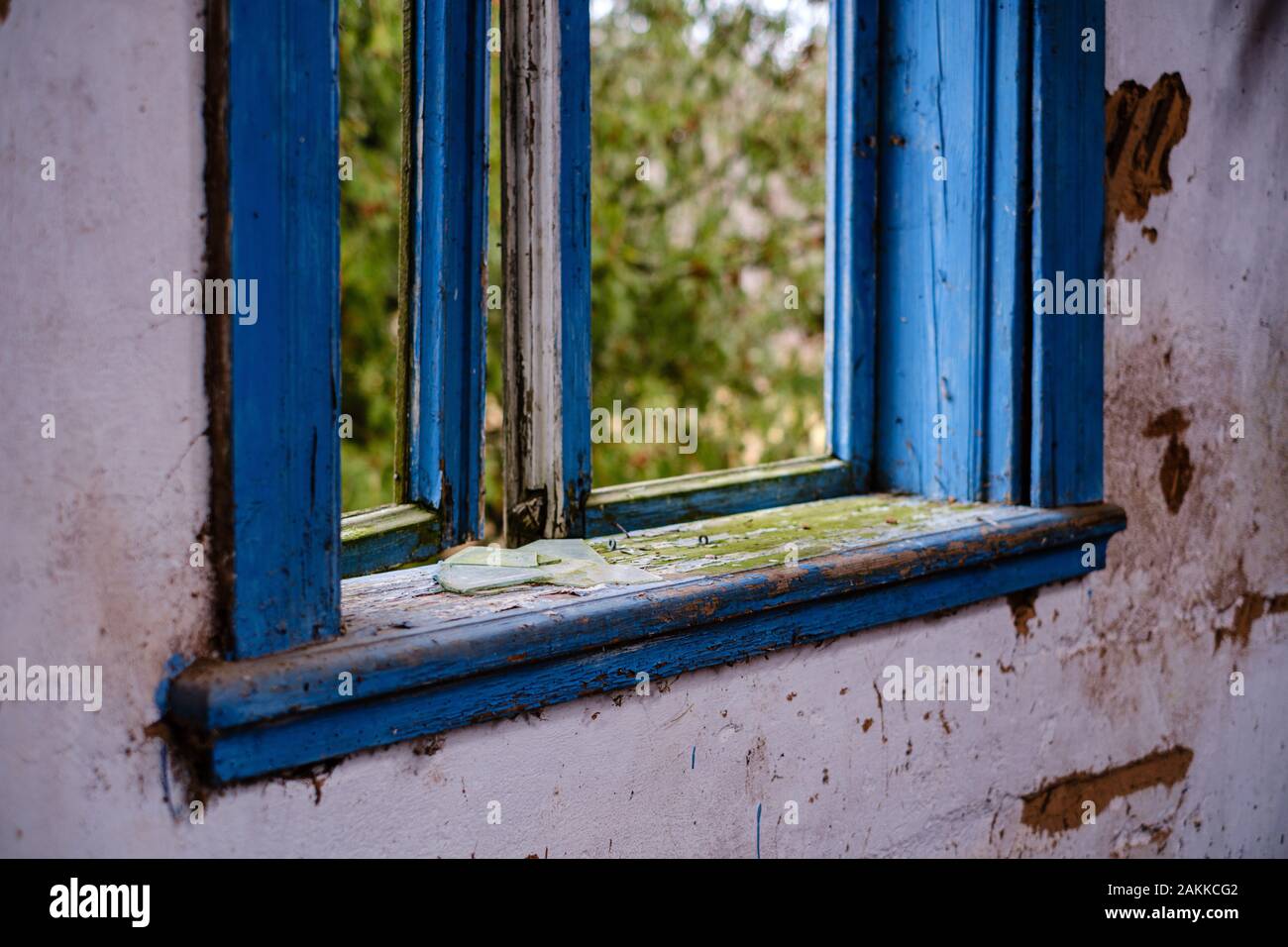 old abandoned house interior with broken furniture and empty windows ...