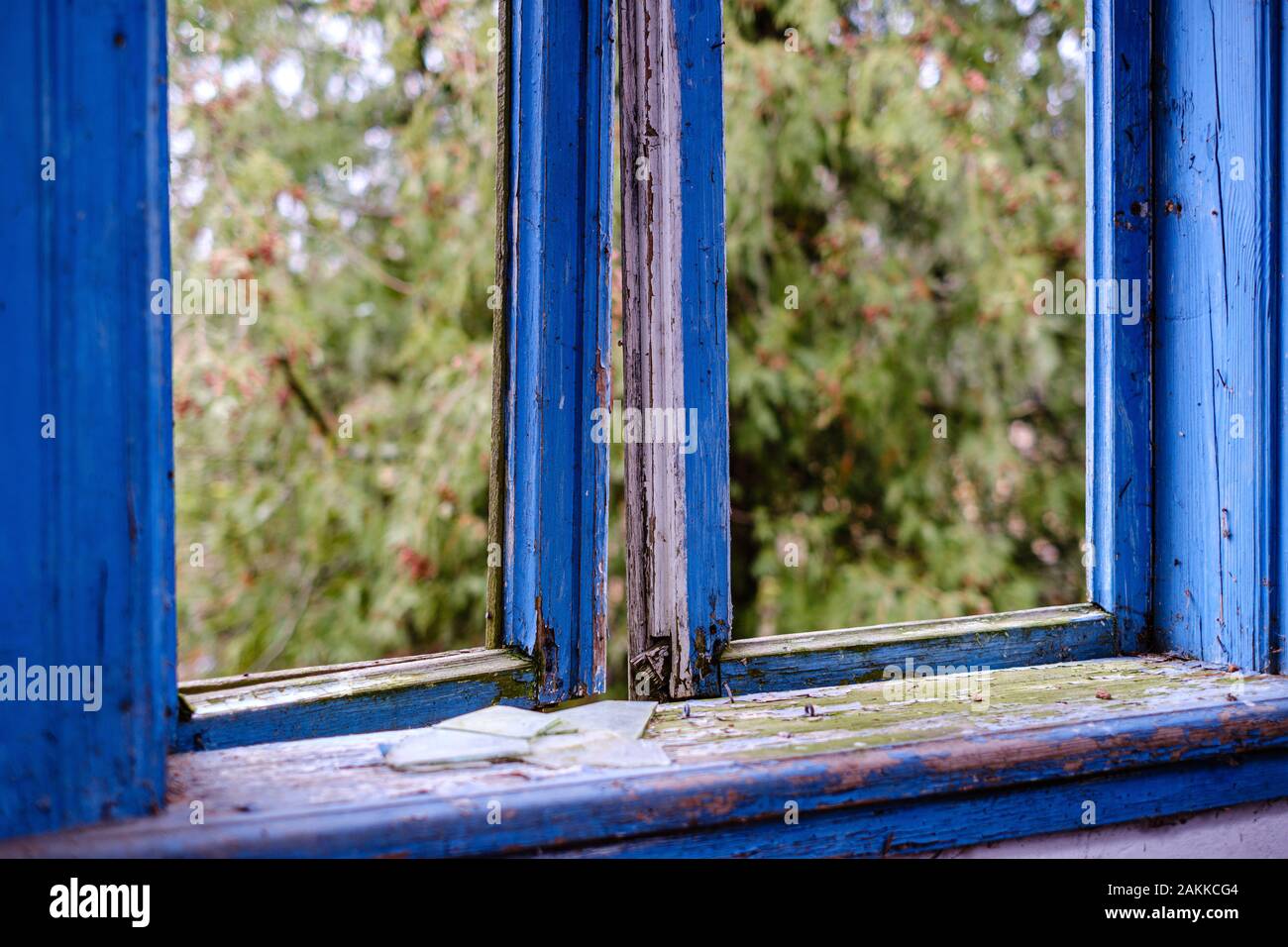 old abandoned house interior with broken furniture and empty windows ...