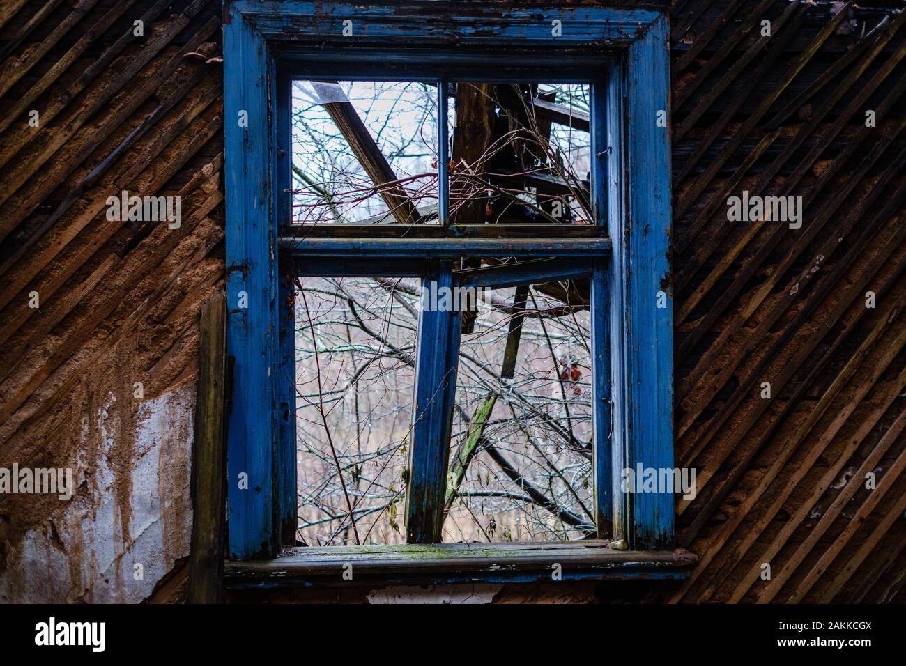 old abandoned house interior with broken furniture and empty windows ...