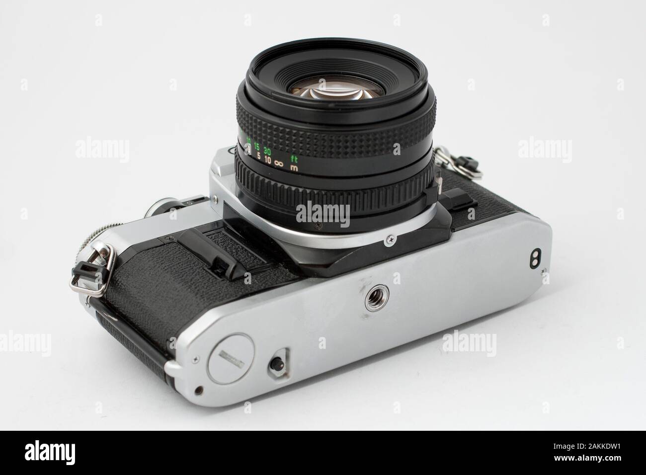 Classic analog single-lens reflex camera isolated on white background ...