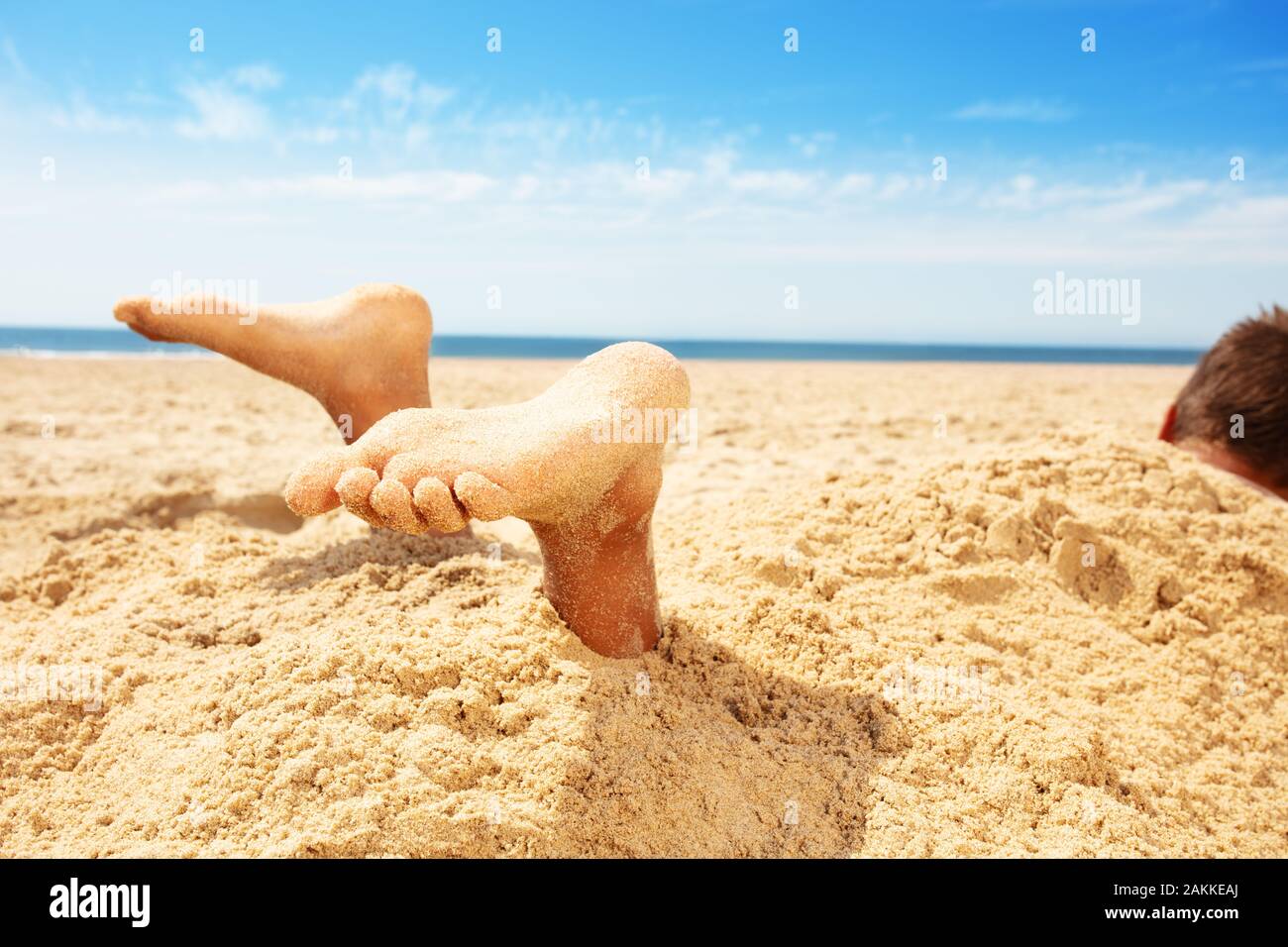 Body covered sand man hi-res stock photography and images - Alamy