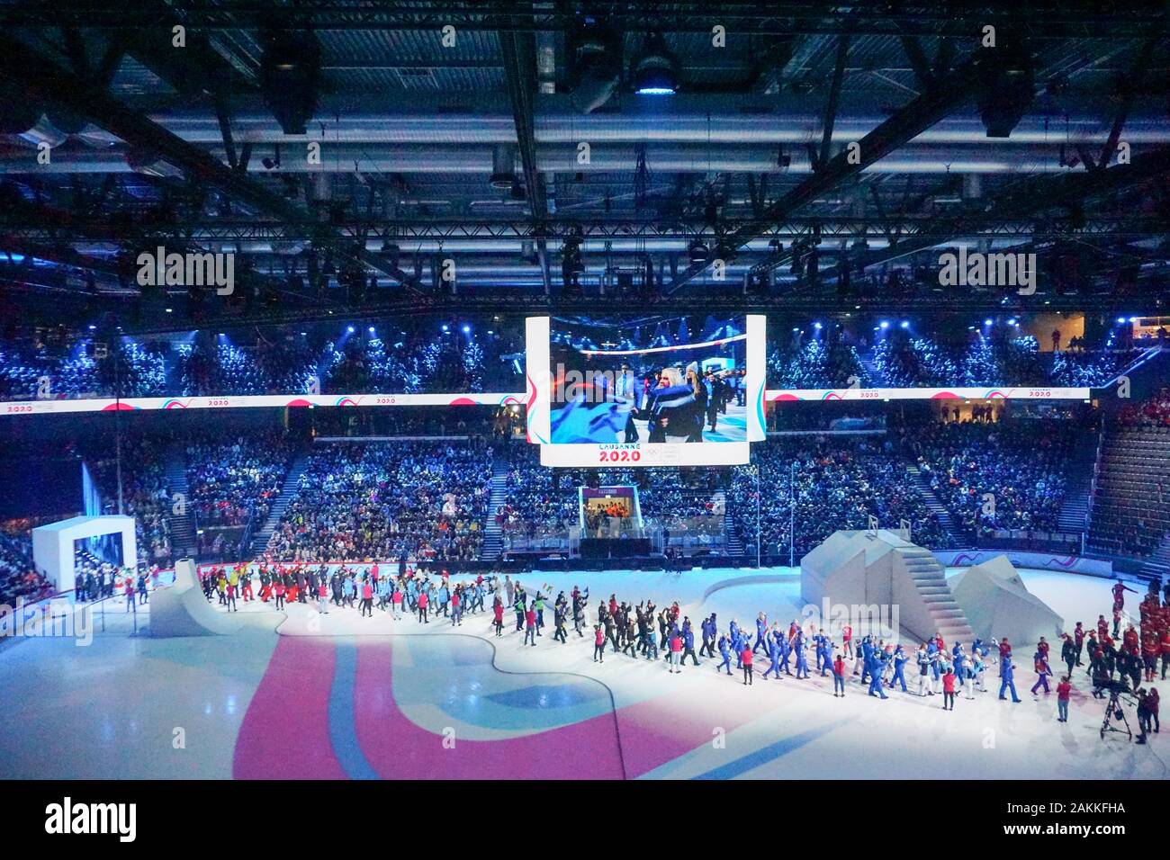 LAUSANNE, SWITZERLAND - JANUARY 09: Athletes enter the arena during the ...