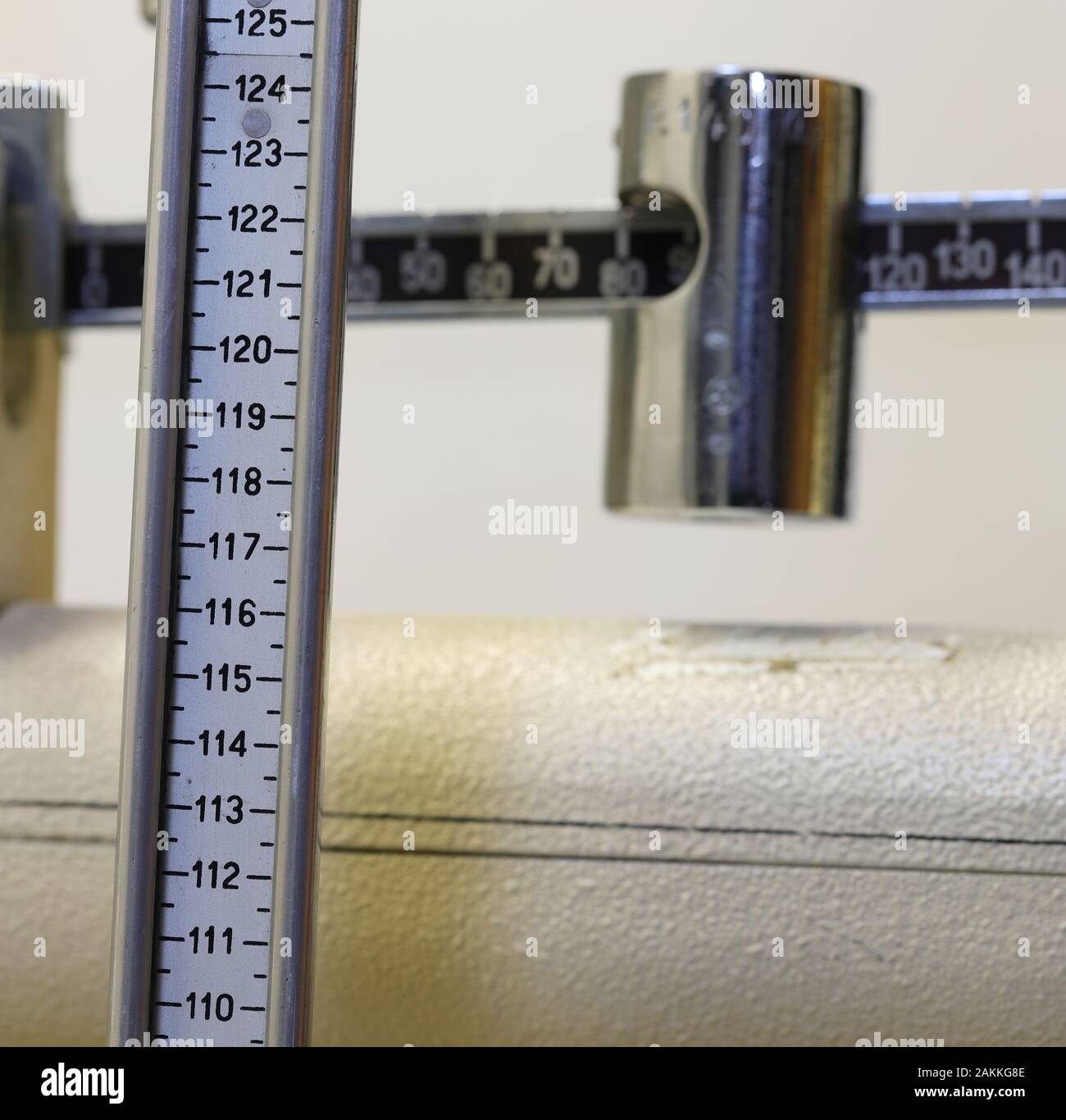 ancient vintage weight scale with graduated rod in the medical clinic ...