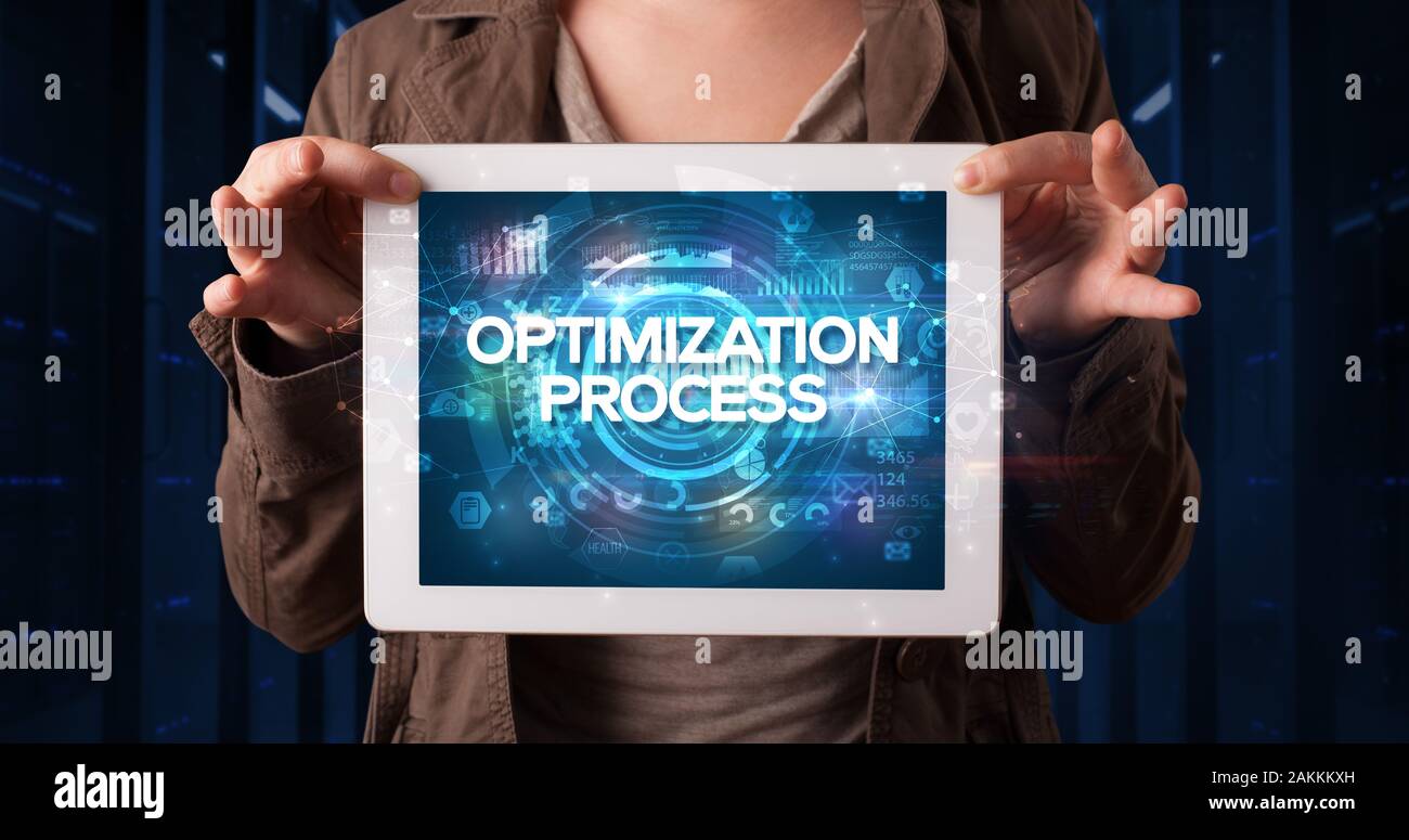 Young business person working on tablet and shows the inscription ...