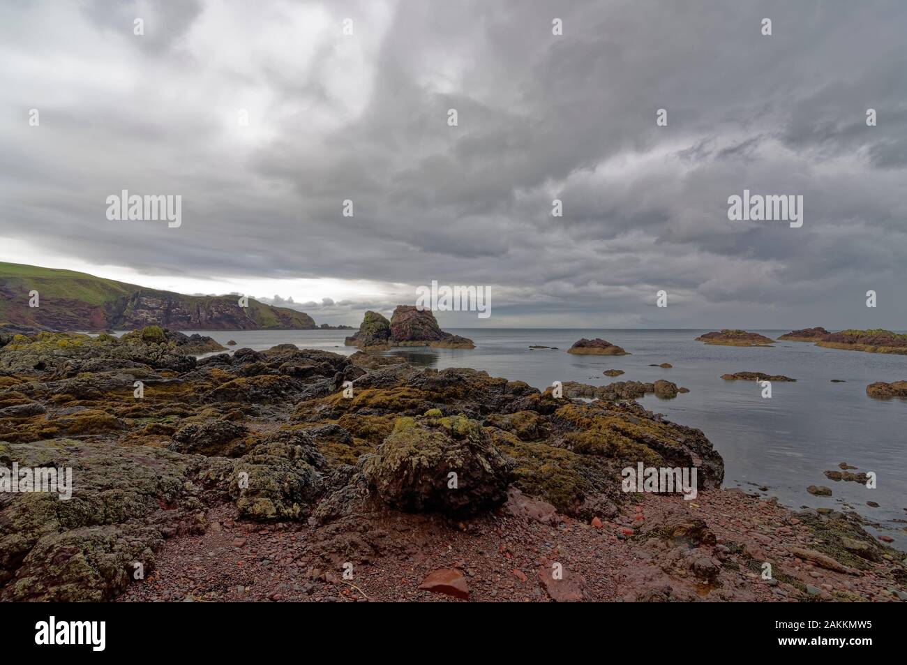 The Rocky Sandstone beach at St Alb's with the Cathedral Rock in the ...