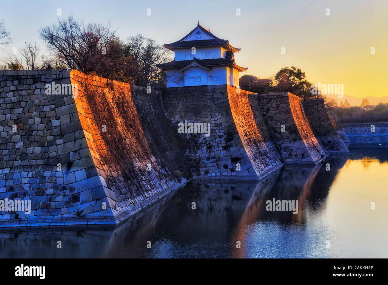 ANcient samurai shogun castle in Osaka surrounded by moat with water ...
