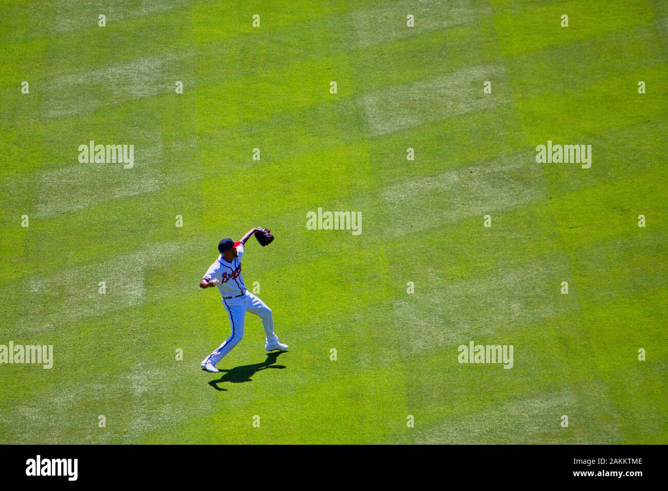 Throwing the Ball Stock Photo - Alamy