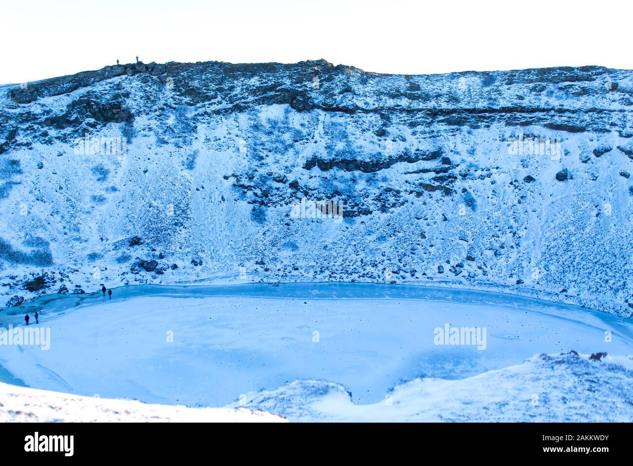 Kerid lake frozen in winter in the crater of an extinct volcano ...