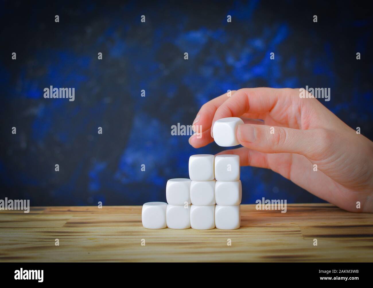 wooden cubes on table background, for including a business message ...